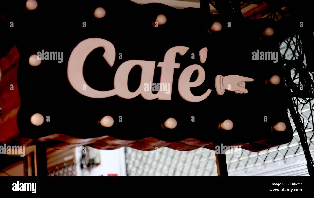 Sunny day and cafe sign hi-res stock photography and images - Alamy