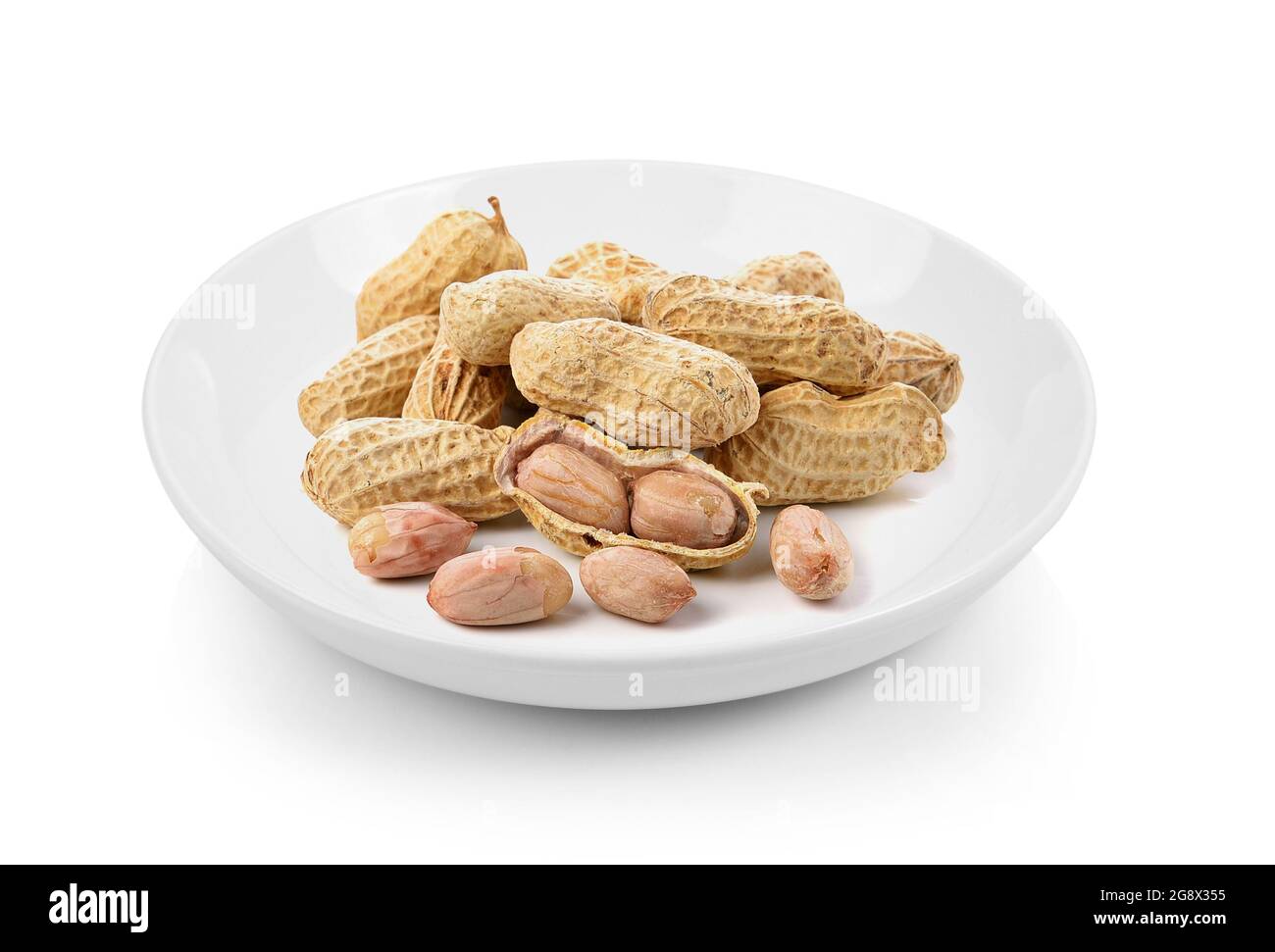 peanut in plate on white background Stock Photo - Alamy