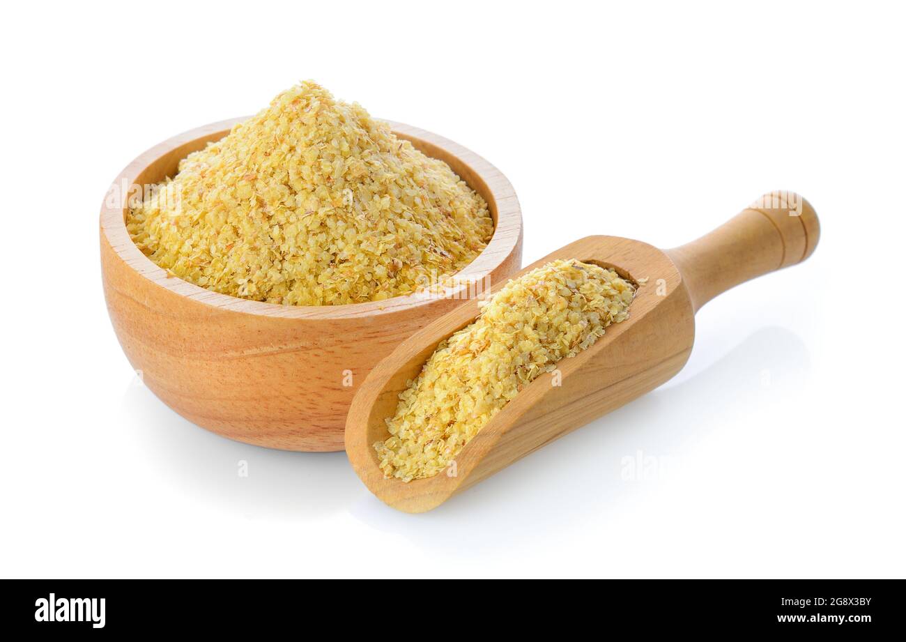 Wheat germ in wood bowl and scoop on white background Stock Photo - Alamy