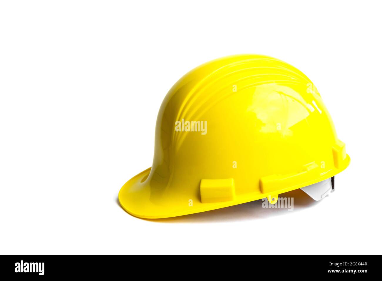Plastic safety helmet yellow color isolated on white background ...