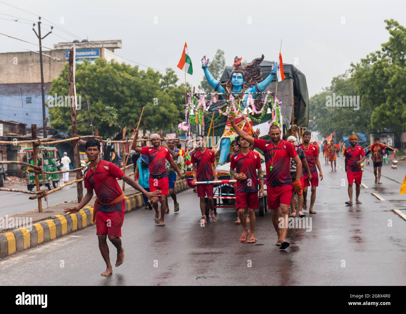 GHAZIABAD, INDIA - JULY 2019: A hindu devotee carrying kanwar on their ...