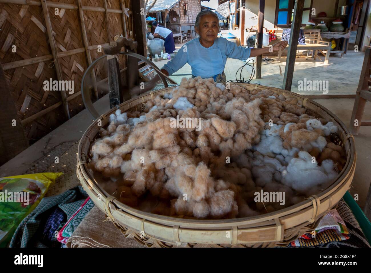 Lady spinning wool spinning wheel hi-res stock photography and images ...