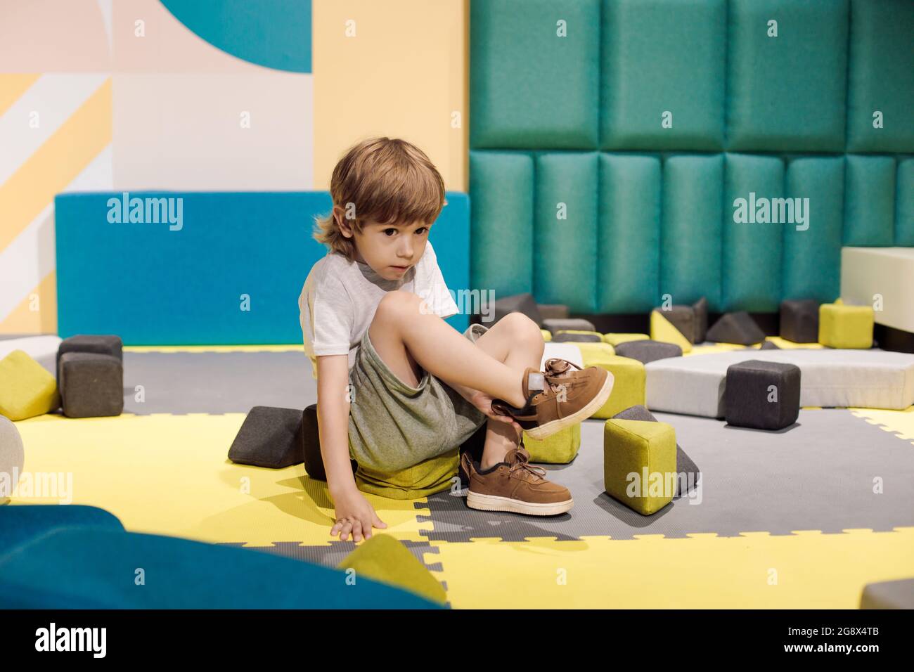 Child is playing alone in playroom. Problems with communications ...