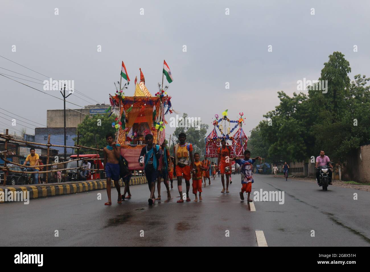GHAZIABAD, INDIA - JULY 2019: A hindu devotee carrying kanwar on their ...