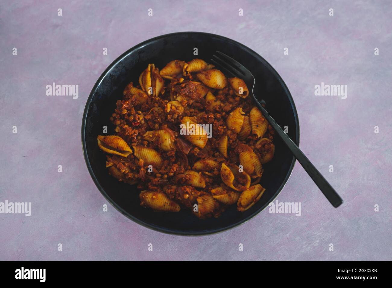 vegan lentil bolognese with shell pasta, healthy plant-based food ...