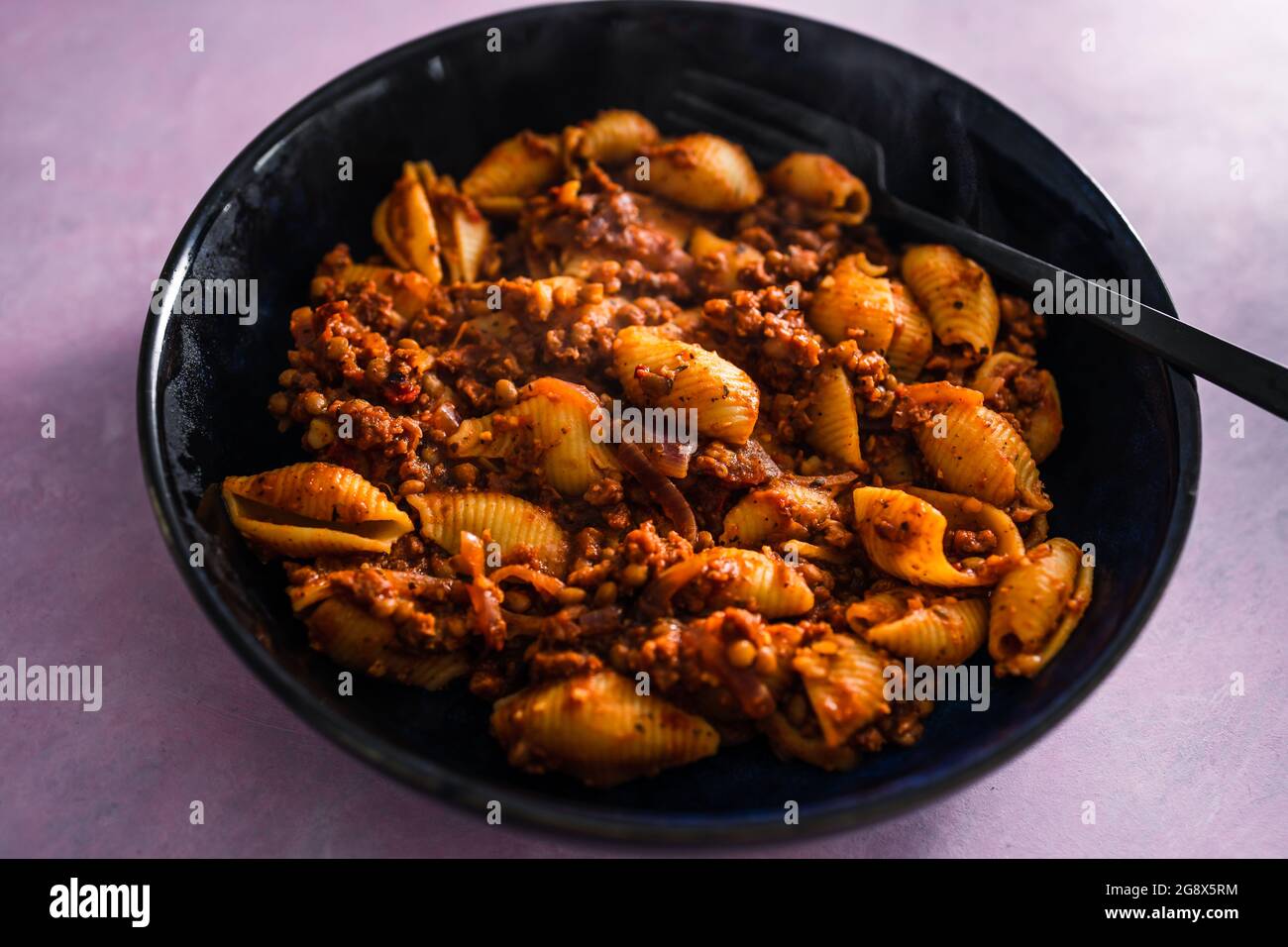 vegan lentil bolognese with shell pasta, healthy plant-based food ...