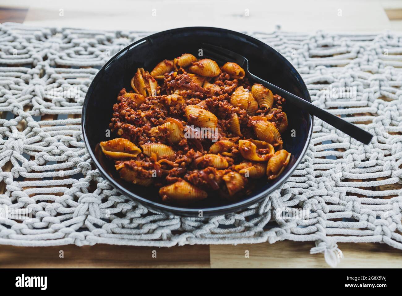vegan lentil bolognese with shell pasta, healthy plant-based food ...