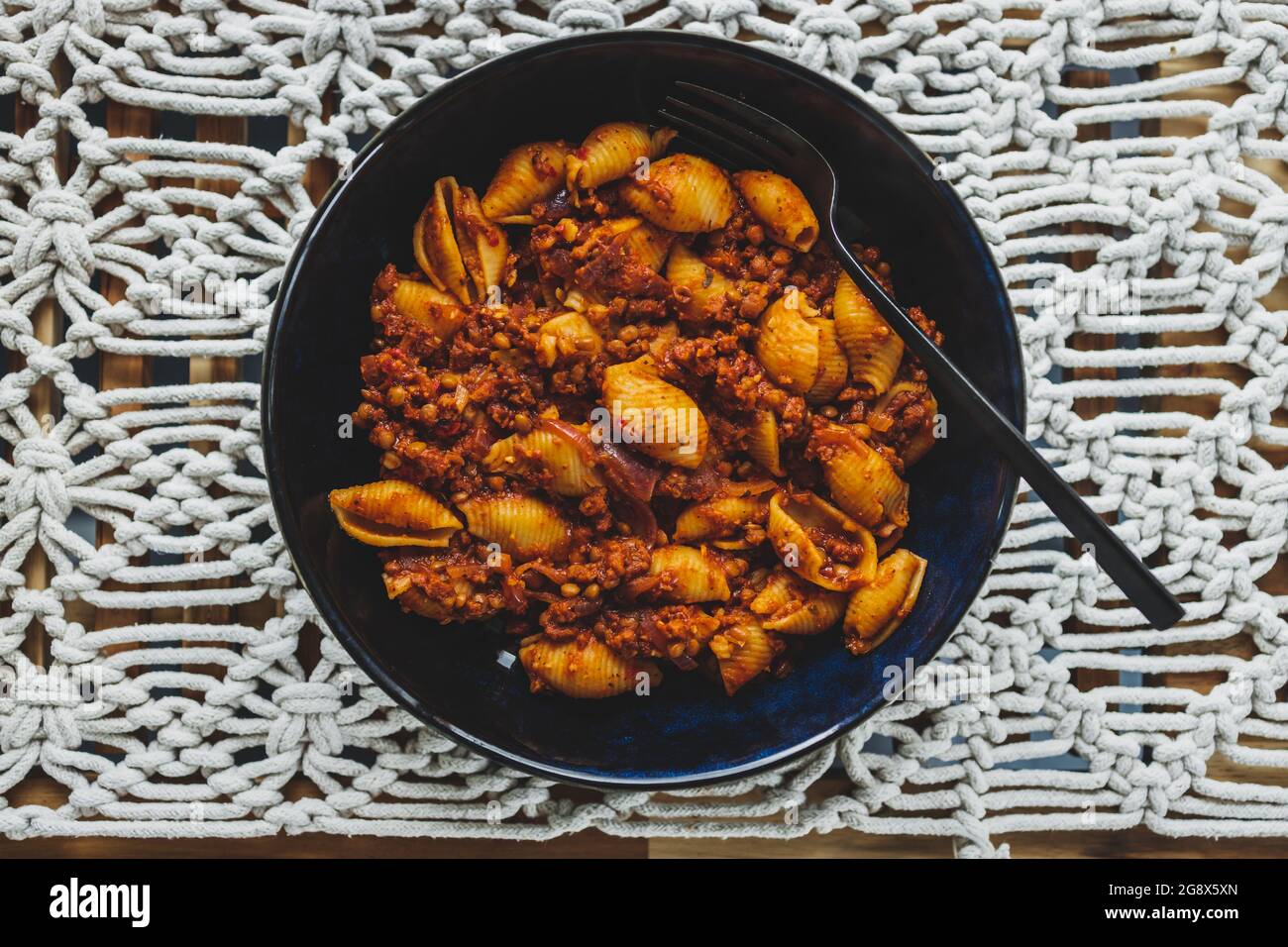 vegan lentil bolognese with shell pasta, healthy plant-based food ...