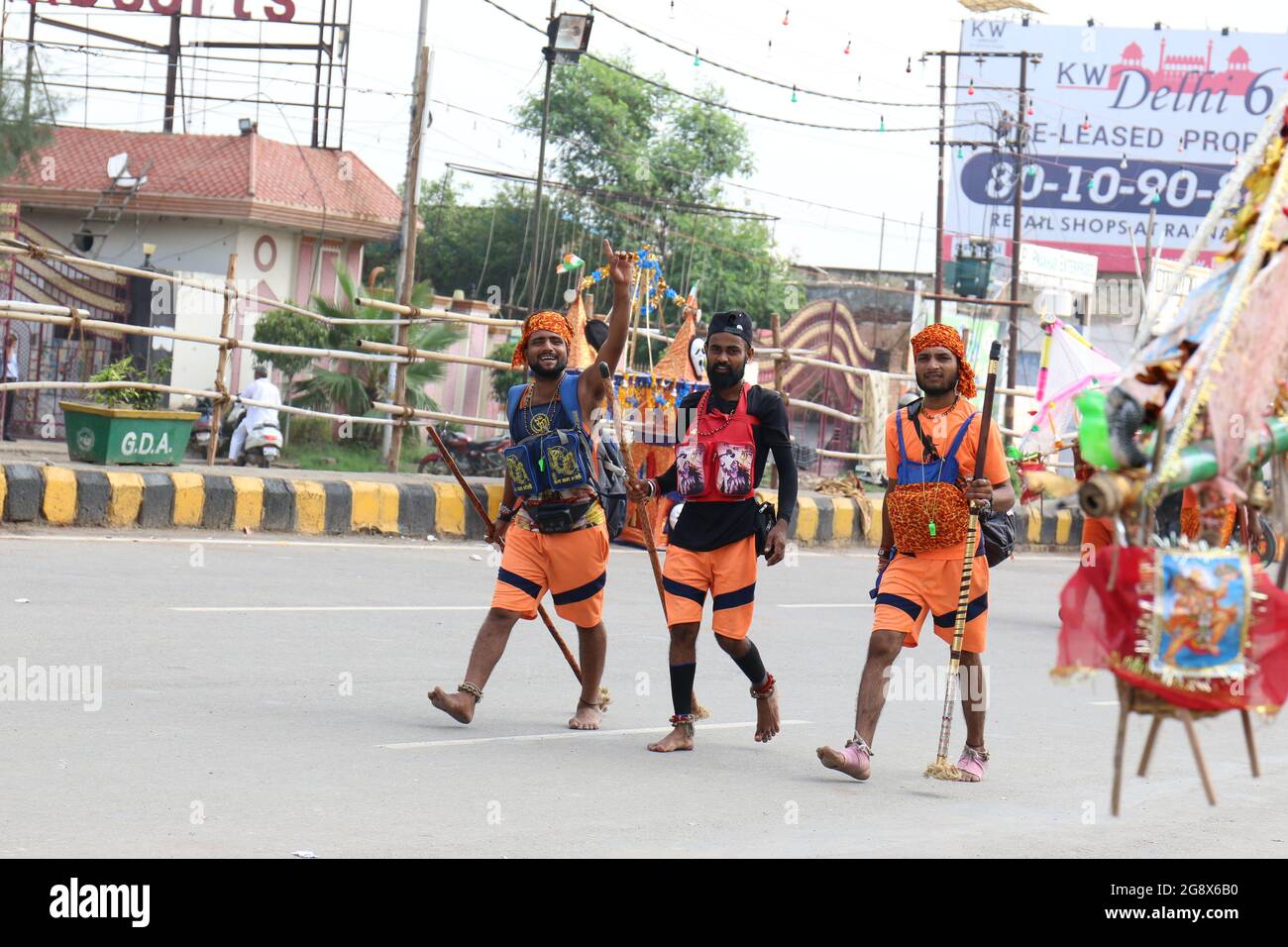 GHAZIABAD, INDIA - JULY 2019: A hindu devotee carrying kanwar on their ...