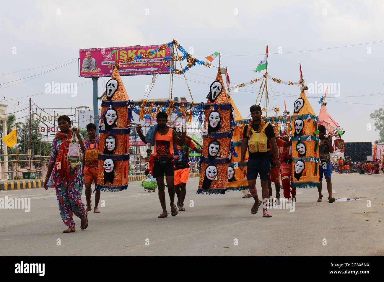 GHAZIABAD, INDIA - JULY 2019: A hindu devotee carrying kanwar on their ...