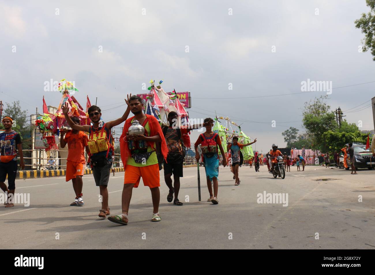 GHAZIABAD, INDIA - JULY 2019: A hindu devotee carrying kanwar on their ...