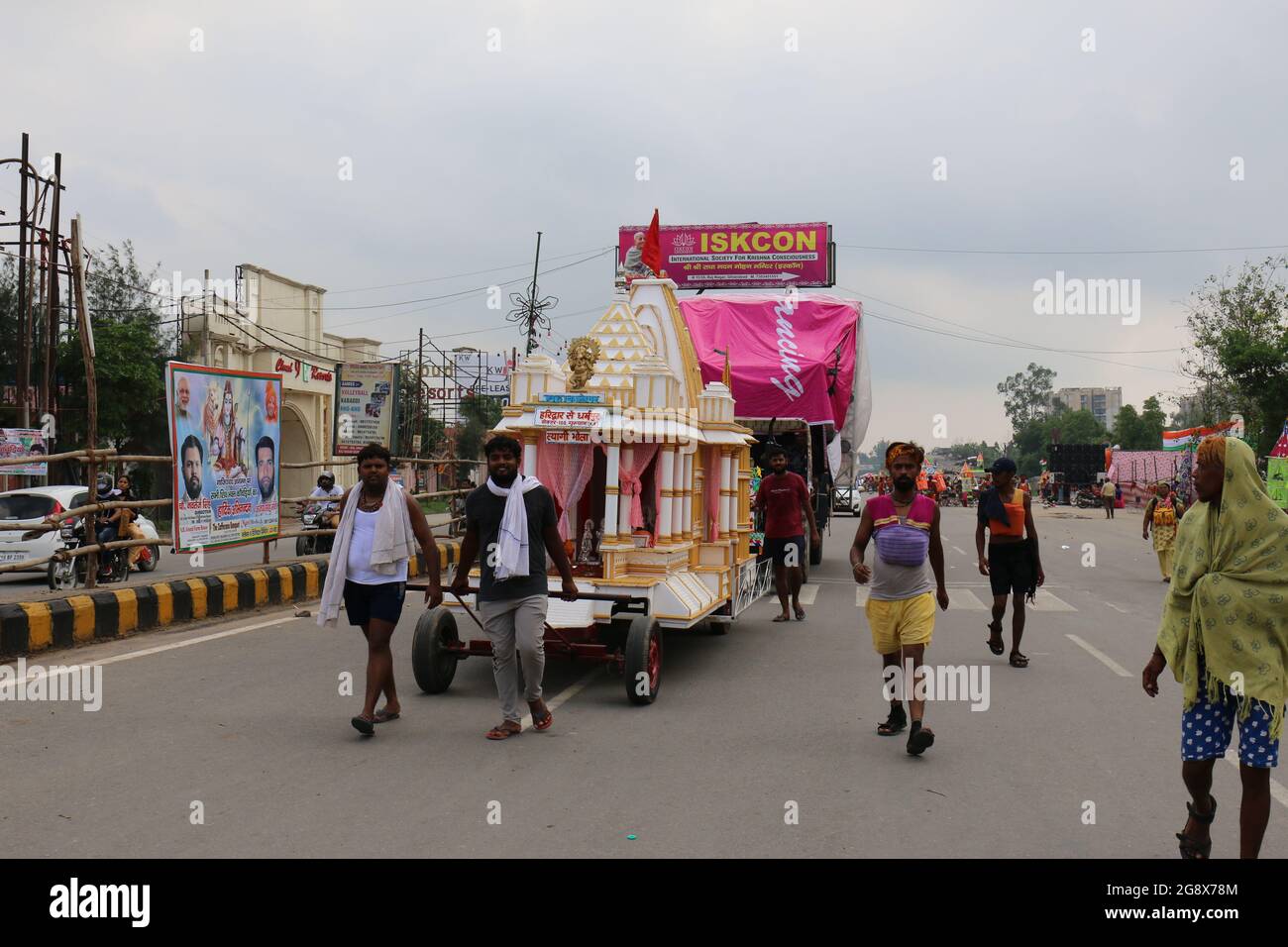 GHAZIABAD, INDIA - JULY 2019: A hindu devotee carrying kanwar on their ...