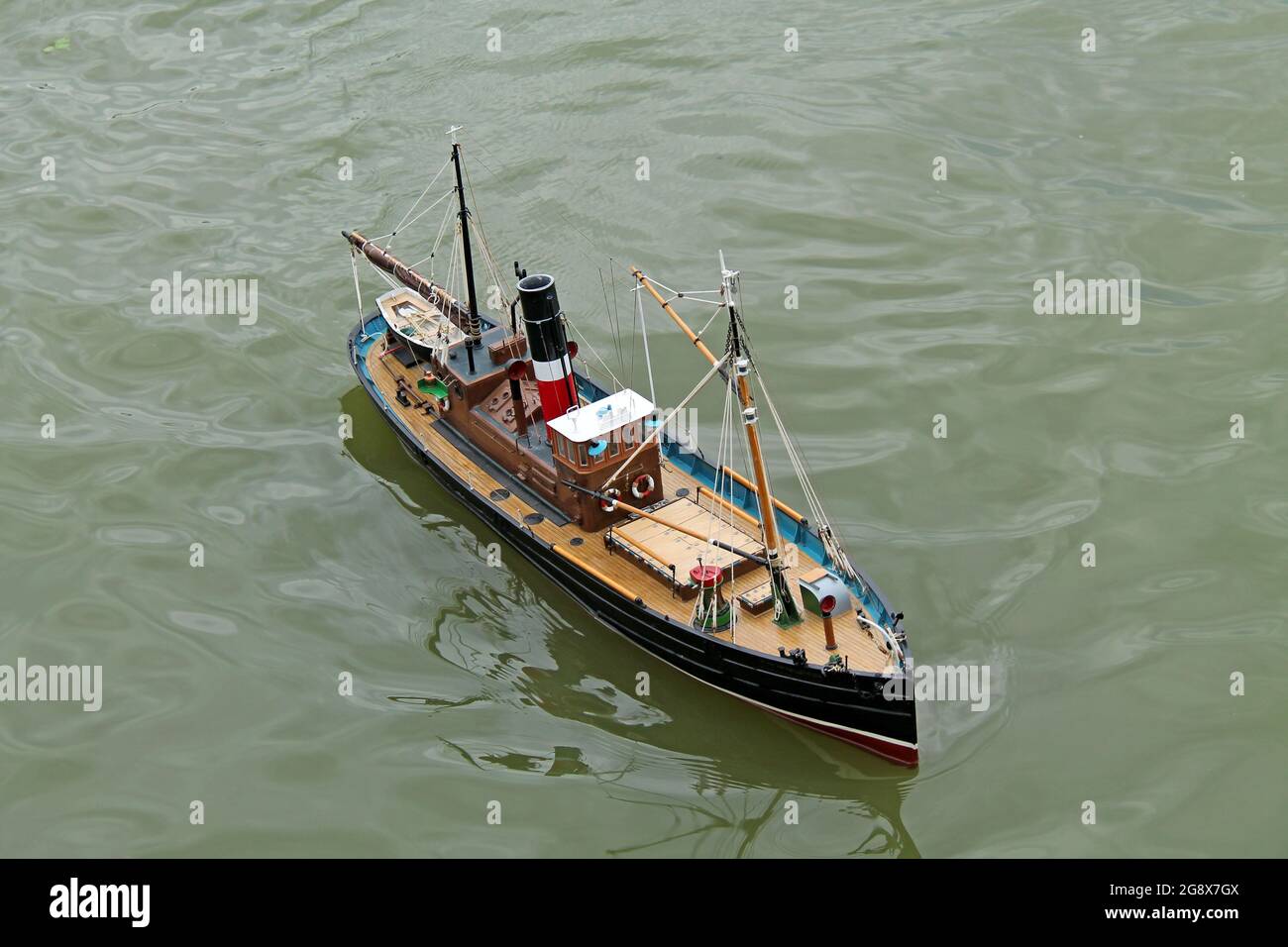 A Radio Controlled Model of a Small Cargo Boat Stock Photo - Alamy