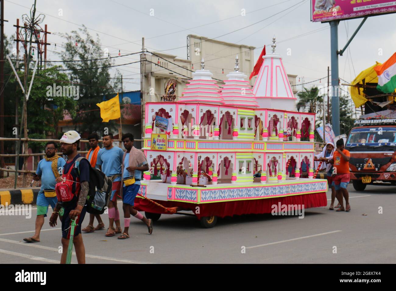 GHAZIABAD, INDIA - JULY 2019: A hindu devotee carrying kanwar on their ...