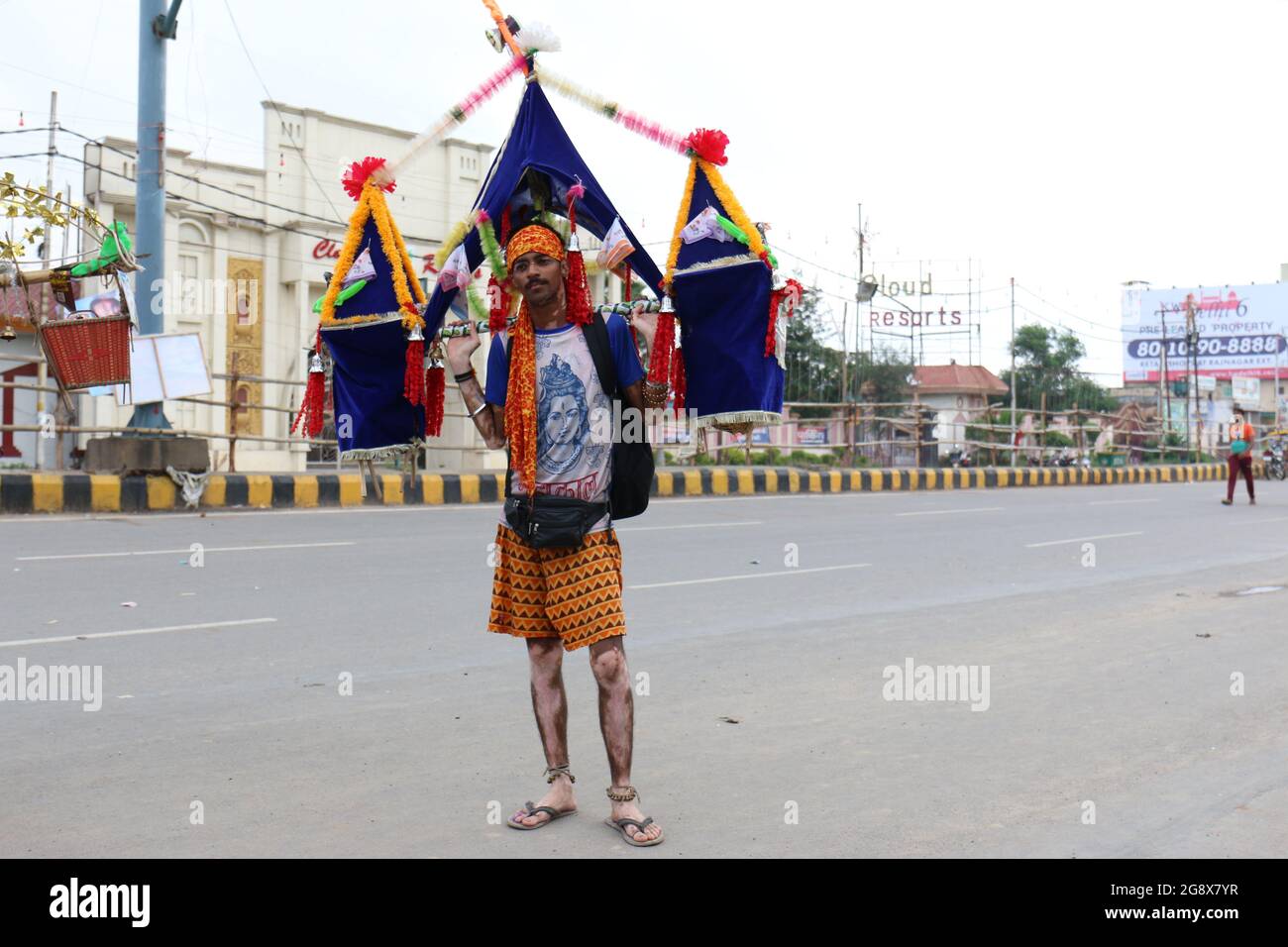 GHAZIABAD, INDIA - JULY 2019: A hindu devotee carrying kanwar on their ...