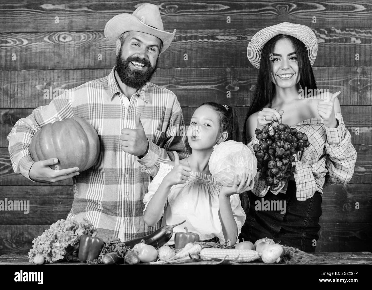 Harvest festival concept. Parents and daughter celebrate harvest ...