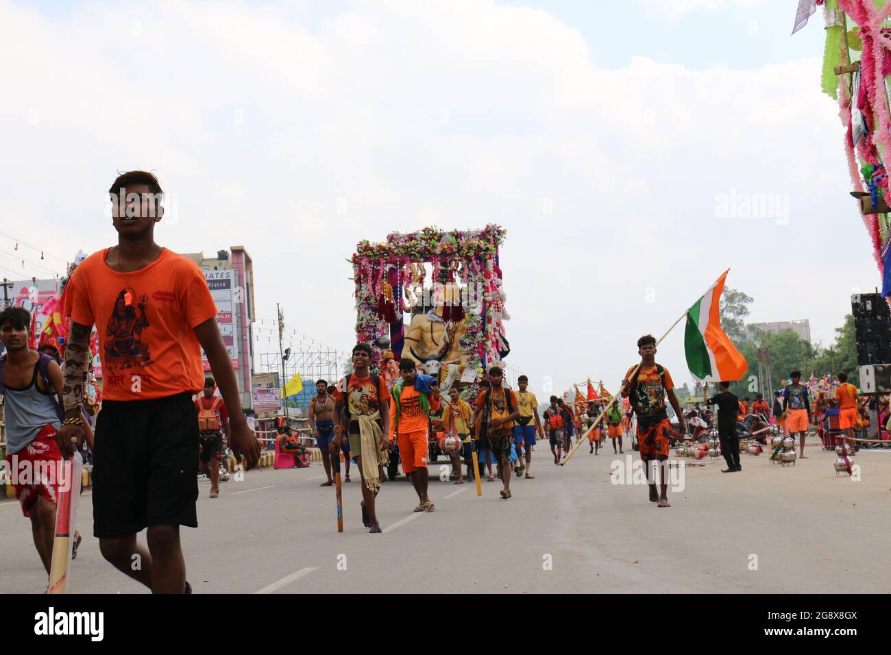 GHAZIABAD, INDIA - JULY 2019: A hindu devotee carrying kanwar on their ...