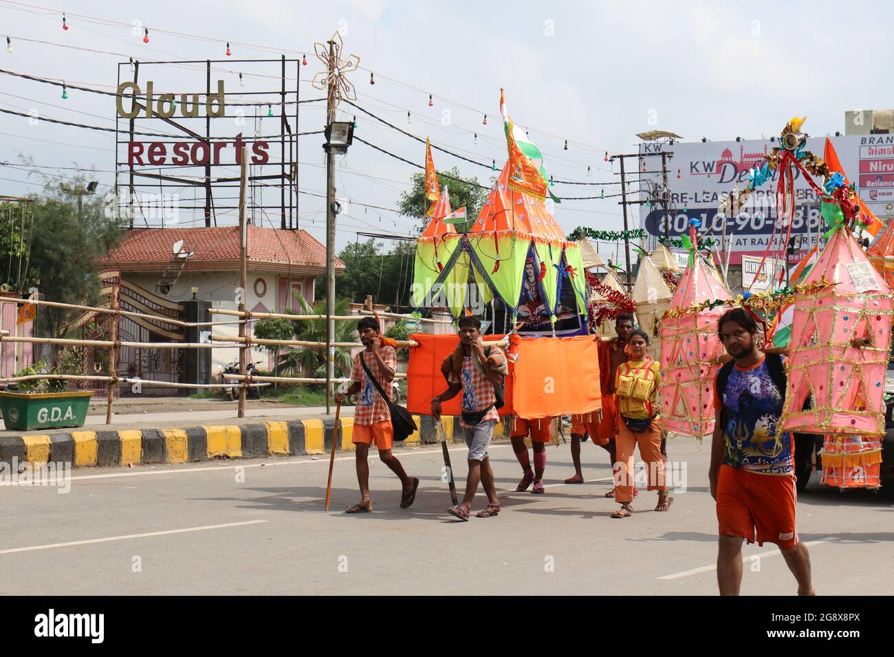 GHAZIABAD, INDIA - JULY 2019: A hindu devotee carrying kanwar on their ...