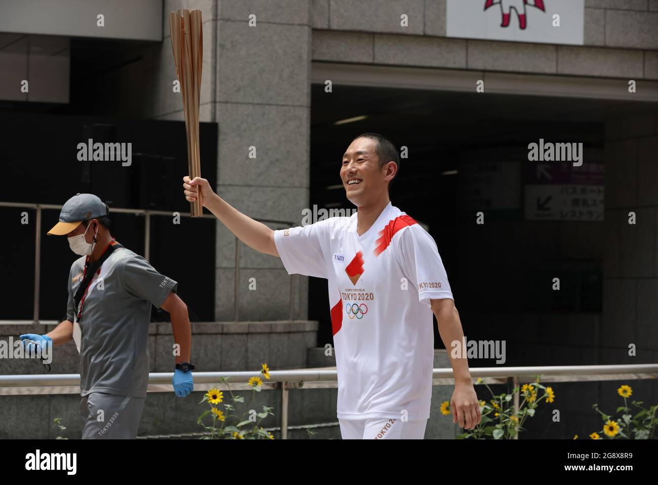 Tokyo, Japan. 23rd July, 2021. Nakamura Kankuro with the Olympic Torch at the Arrival Ceremony ...