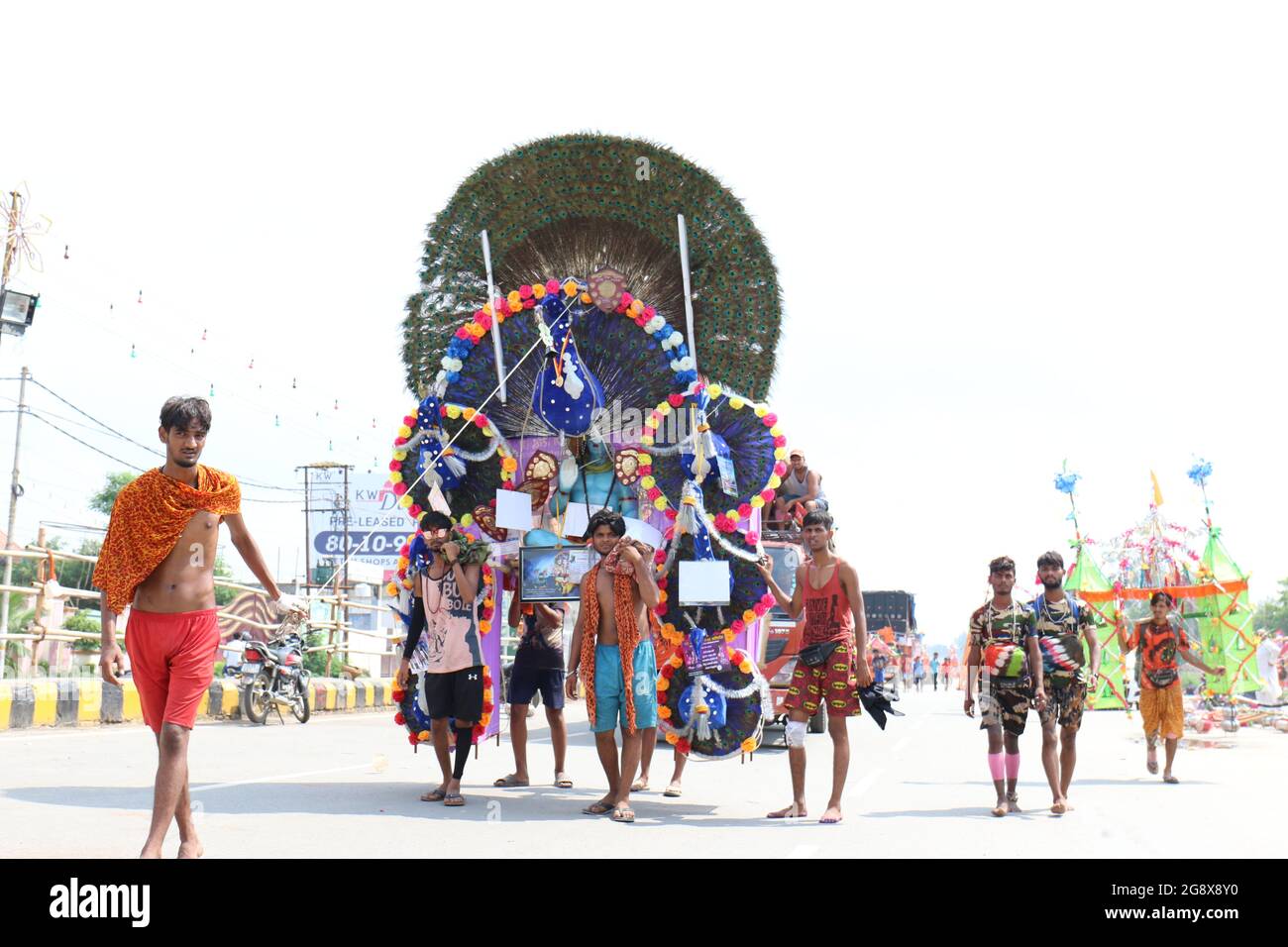 GHAZIABAD, INDIA - JULY 2019: A hindu devotee carrying kanwar on their ...