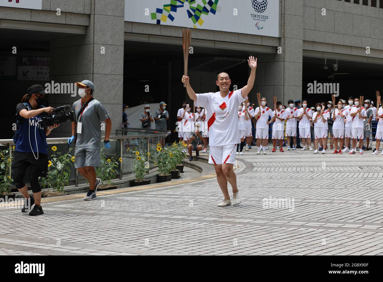Tokyo, Japan. 23rd July, 2021. Nakamura Kankuro with the Olympic Torch at the Arrival Ceremony ...