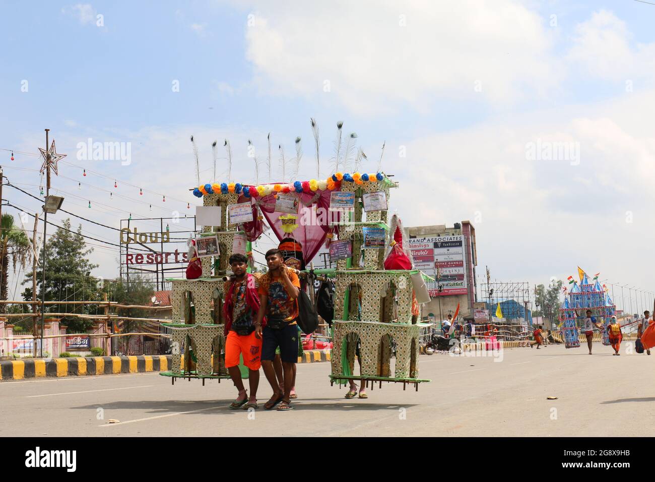 GHAZIABAD, INDIA - JULY 2019: A hindu devotee carrying kanwar on their ...