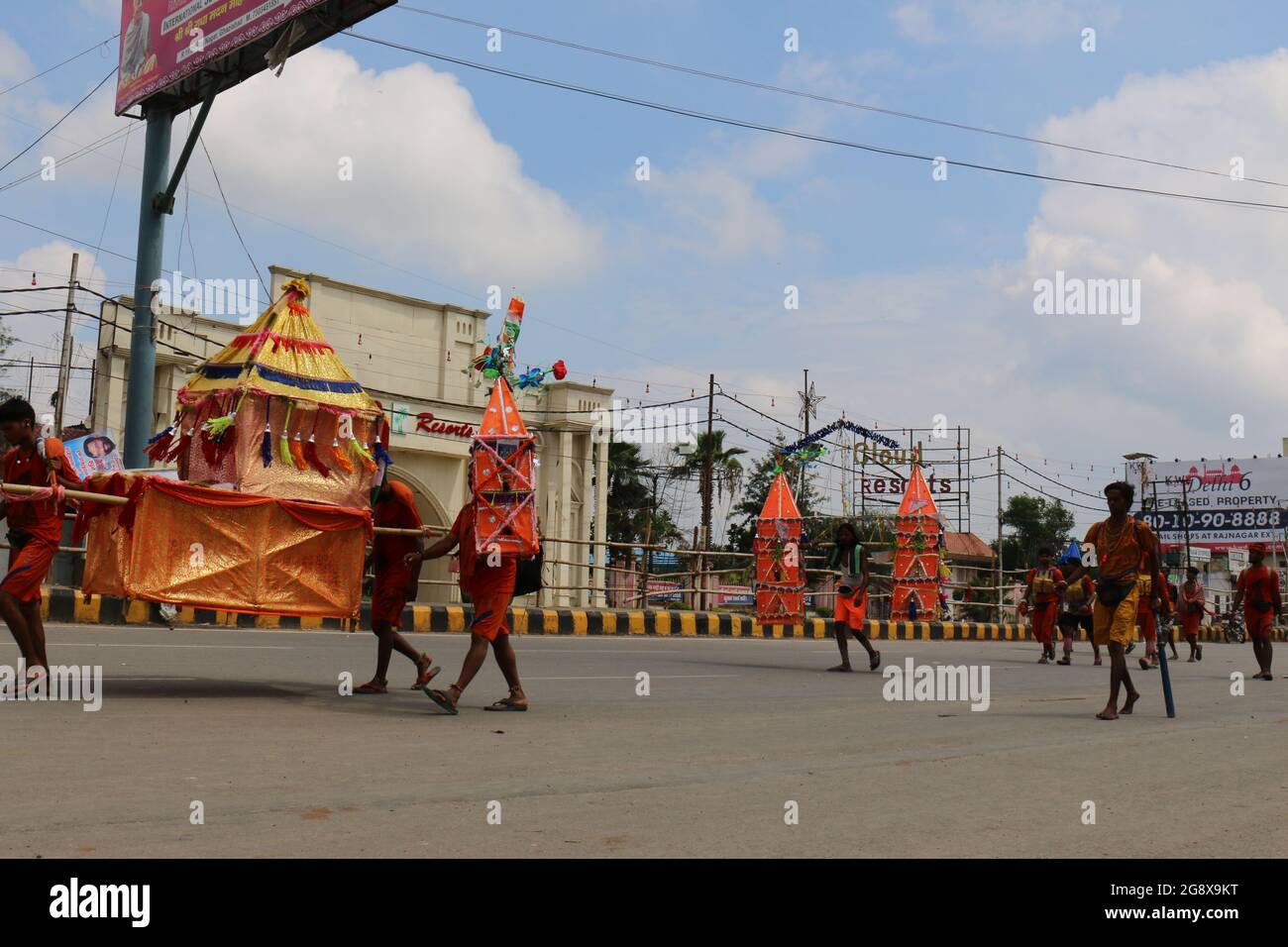 GHAZIABAD, INDIA - JULY 2019: A hindu devotee carrying kanwar on their ...