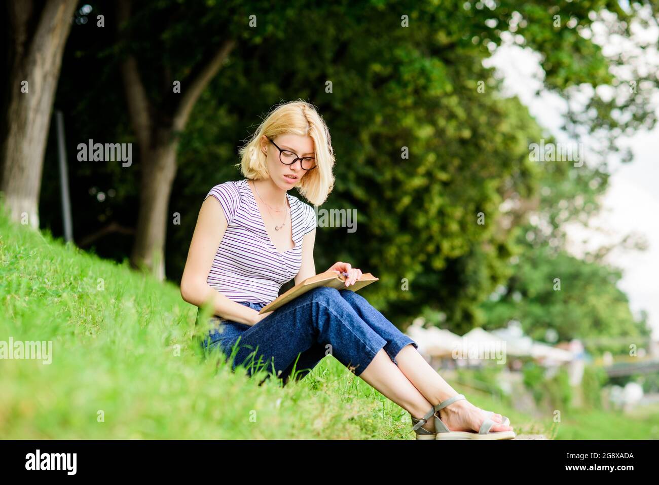 reading is my hobby. Summer study. woman in park reading book. inspired ...