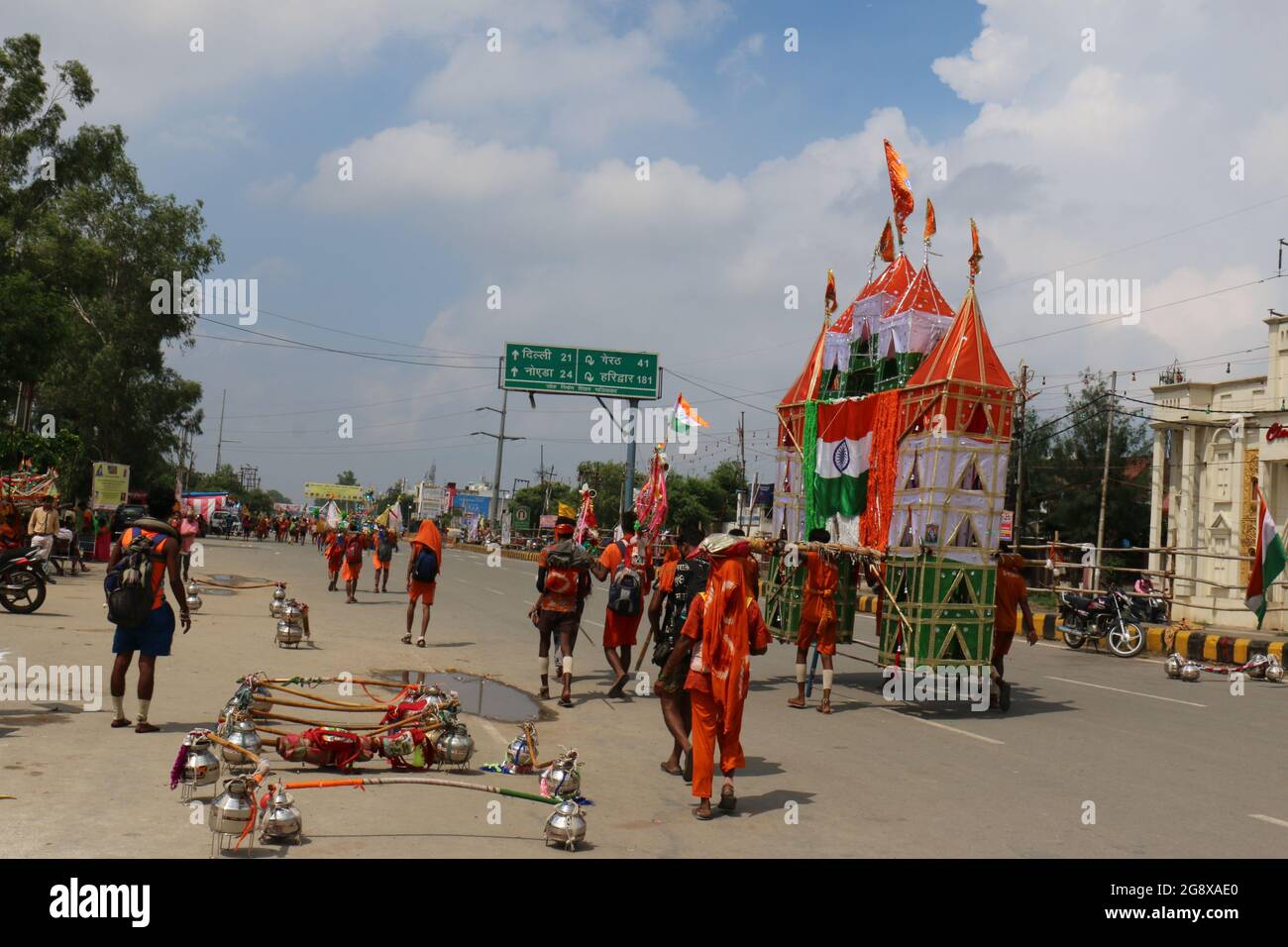 GHAZIABAD, INDIA - JULY 2019: A hindu devotee carrying kanwar on their ...