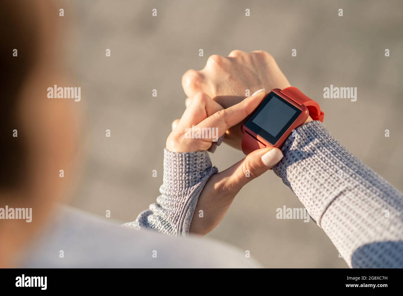 Close up picture of female hand with a smartwatch on it Stock Photo - Alamy