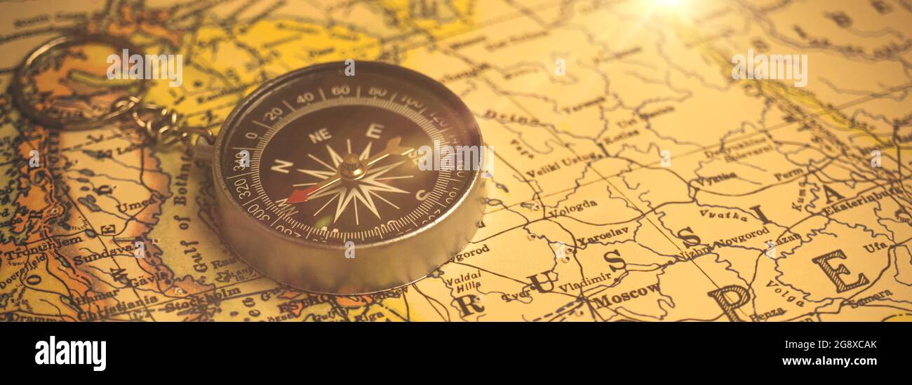 Old compass on a world map, retro banner background for exploration and ...