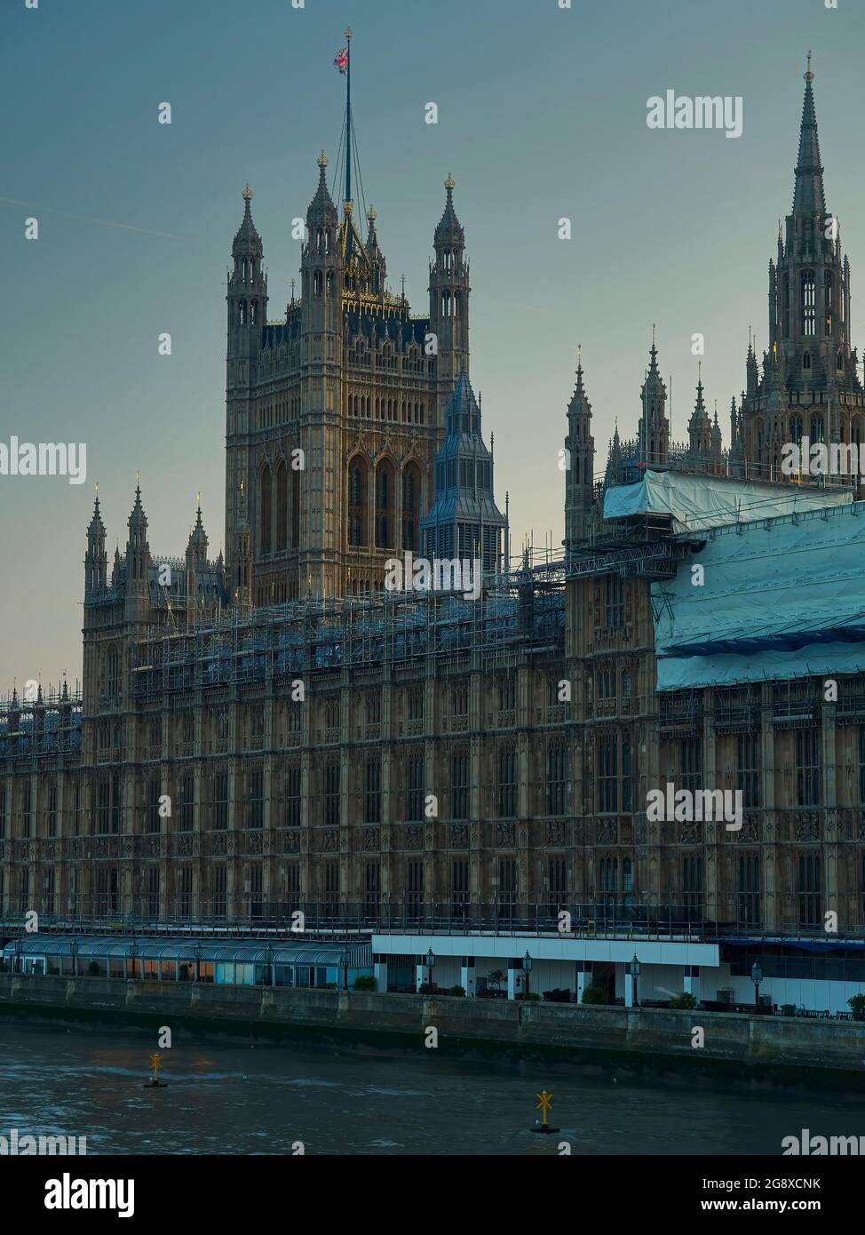 The UK's Houses of Parliament from Westminster Bridge in soft, warm ...
