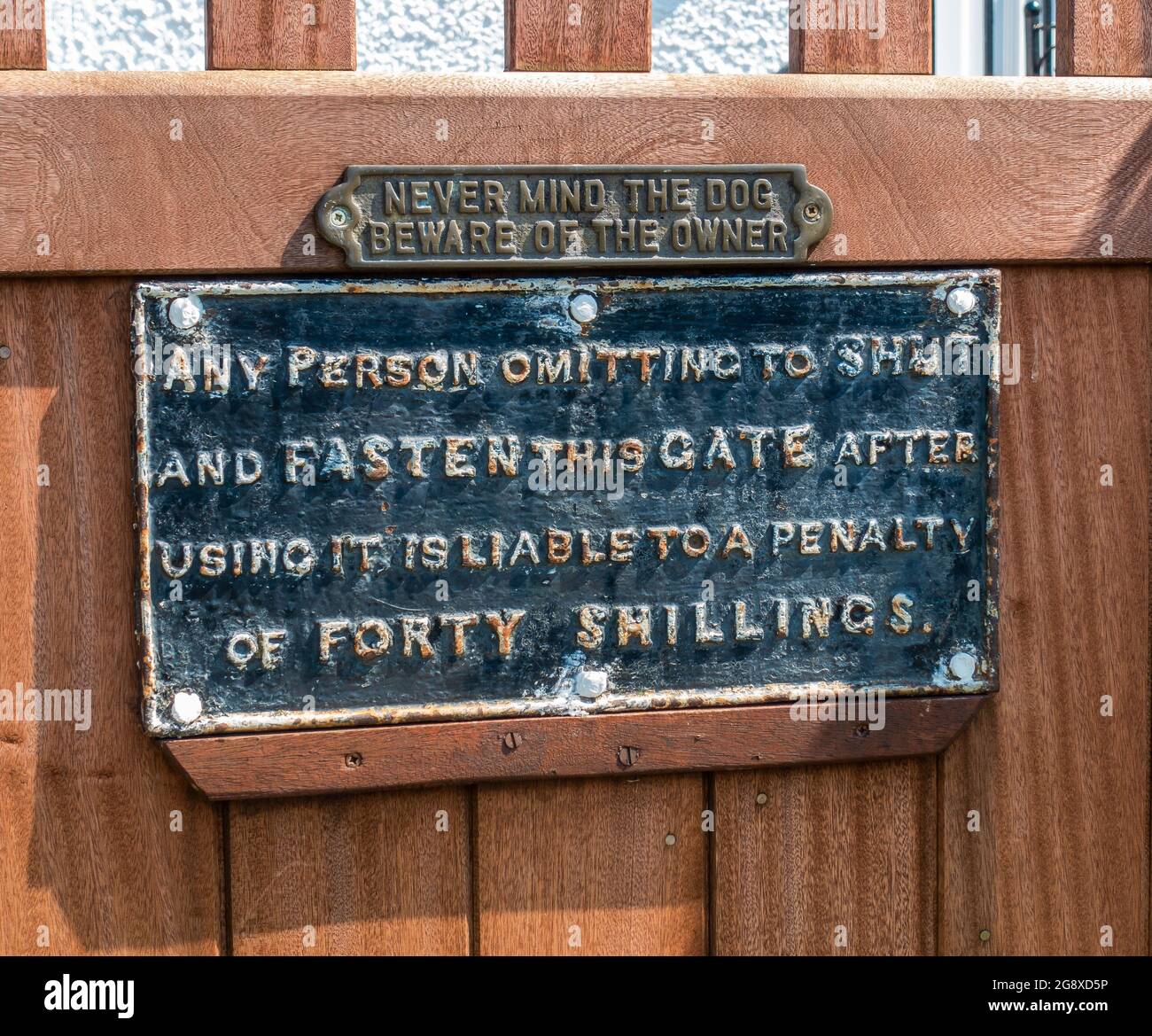 Humorous sign on house hi-res stock photography and images - Alamy