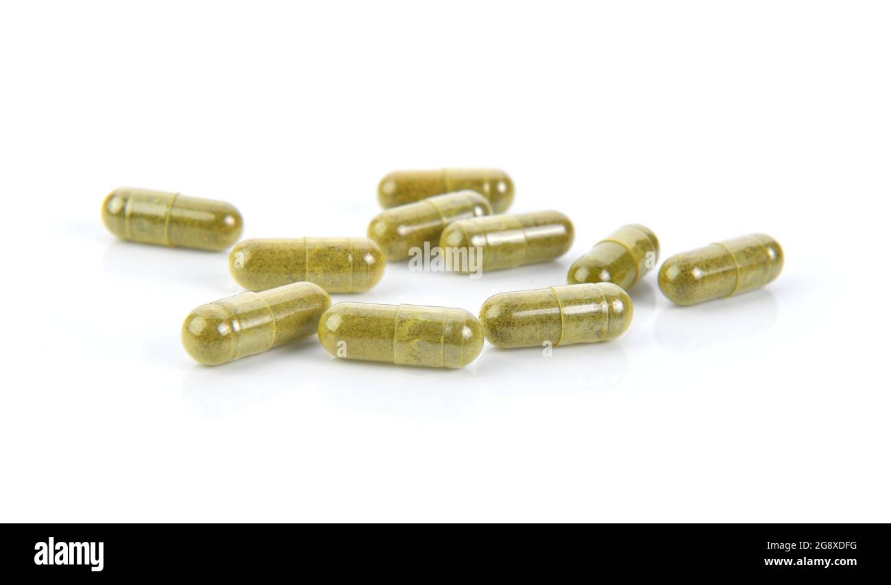 Herbal Capsules on white background Stock Photo - Alamy