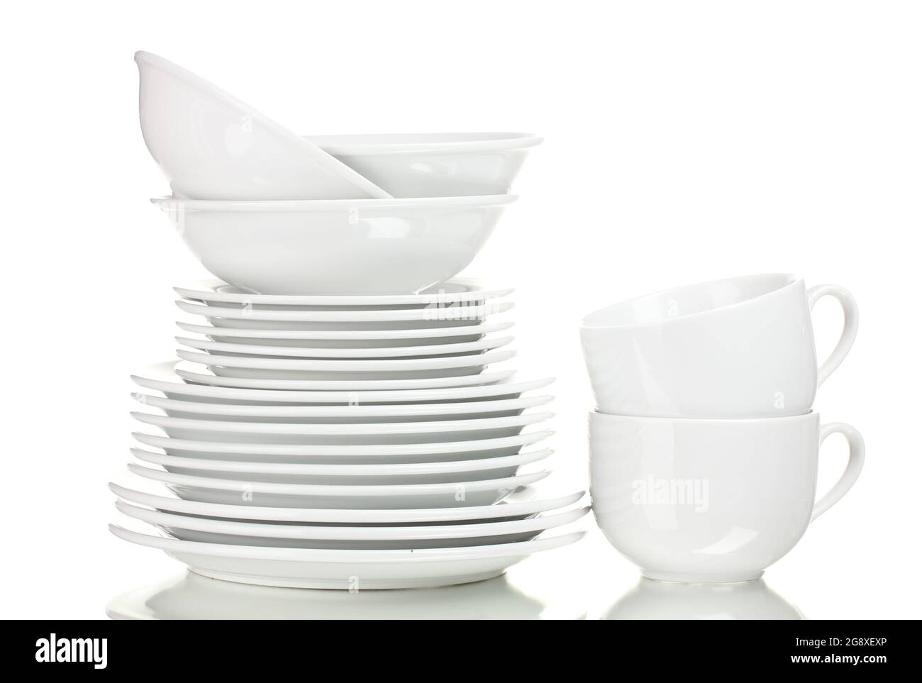 Clean plates and cups isolated on white Stock Photo - Alamy