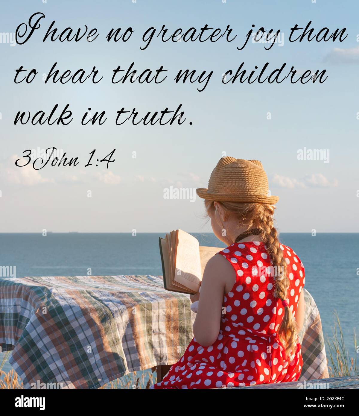 Little girl reading Bible on sea background. Quotes for believers ...