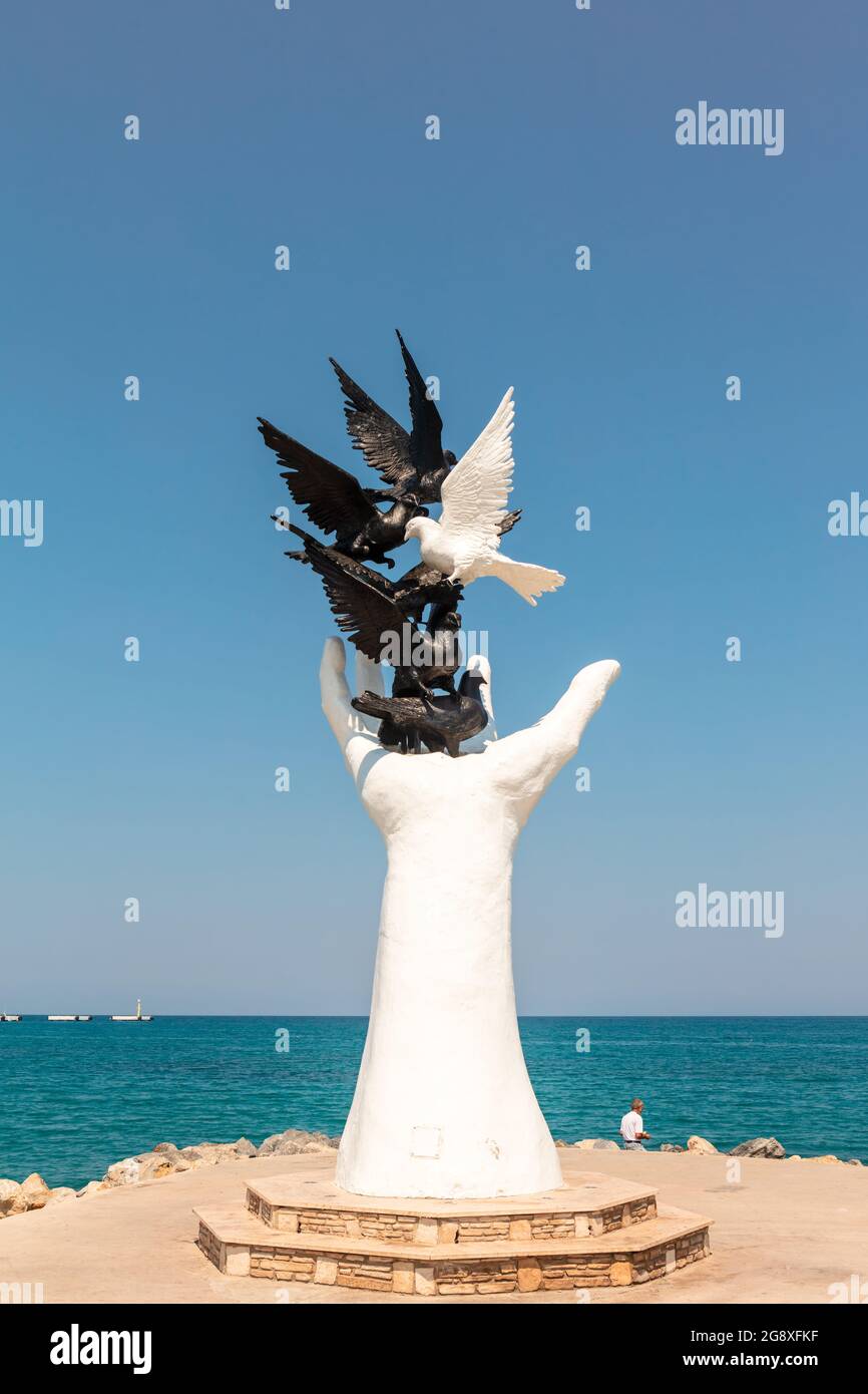 The Hand of Peace sculpture at the seafront in city centre of Kusadasi ...