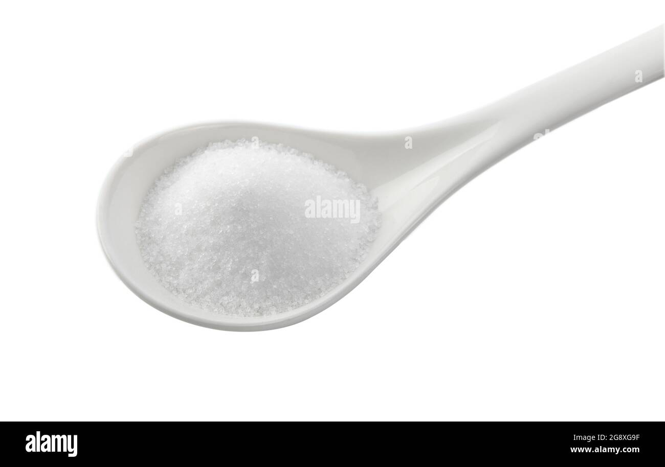 Teaspoon of salt in white background hi-res stock photography and ...