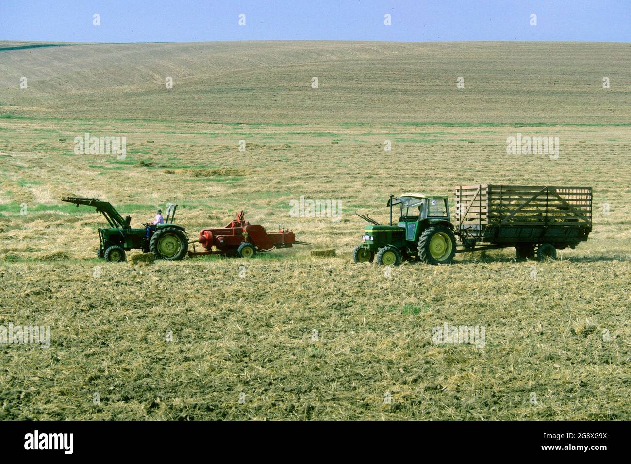 Farmers harvesting hay with tractor in 1981, Pettendorf, Bavaria ...