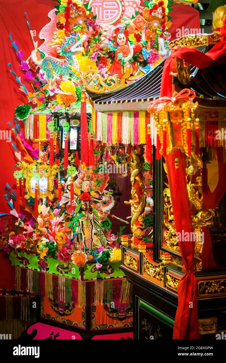 An ornate and colourful shrine at the entrance of the Tin Hau Temple on ...