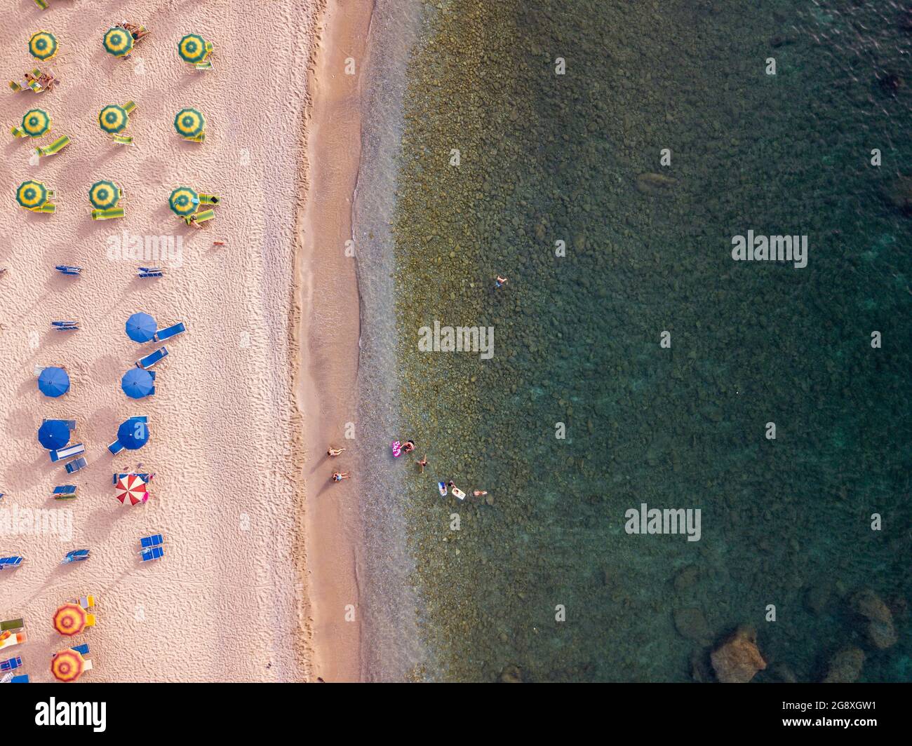 Aerial view of a beach and umbrellas. Tropea, Calabria, Italy ...
