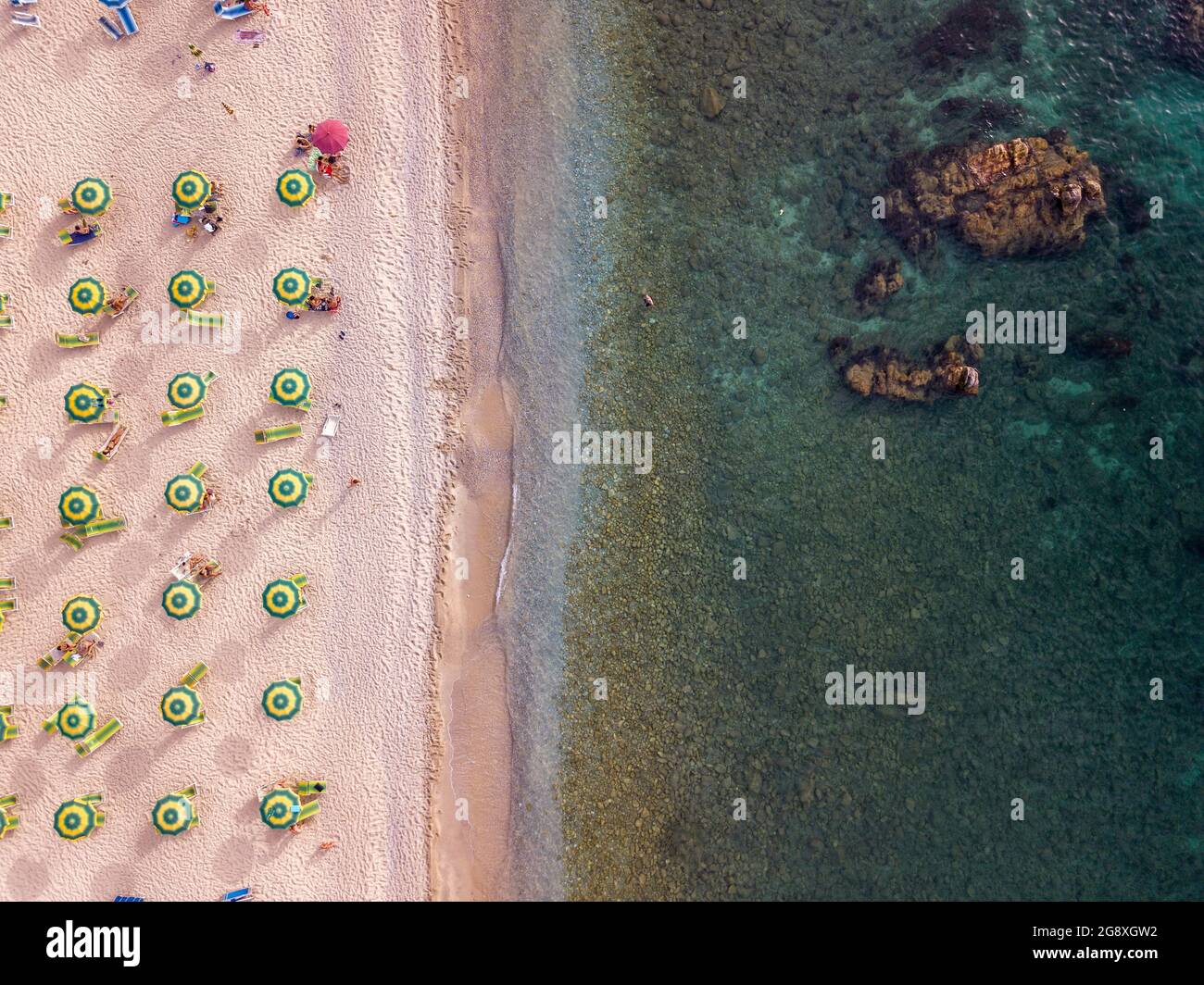 Aerial view of a beach and umbrellas. Tropea, Calabria, Italy ...
