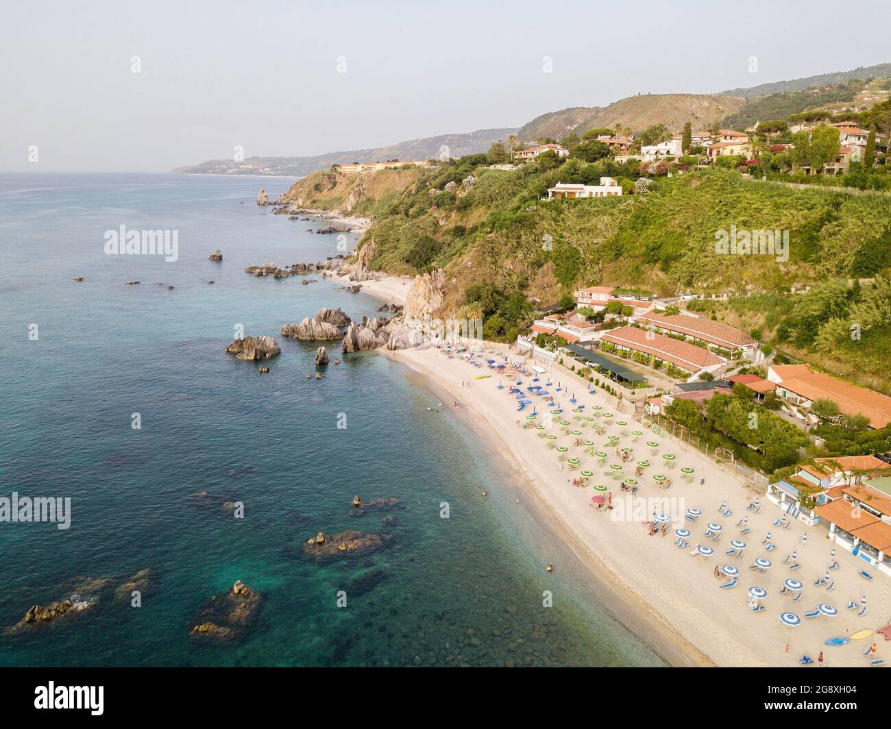 Aerial view of a beach and umbrellas. Tropea, Calabria, Italy ...
