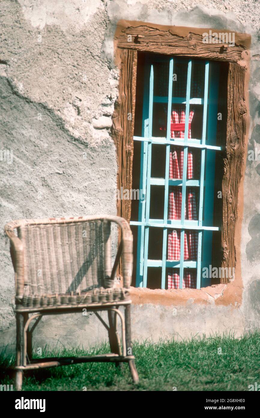 Chair outside window of old house in 1980, Le Casset, Hautes-Alpes ...