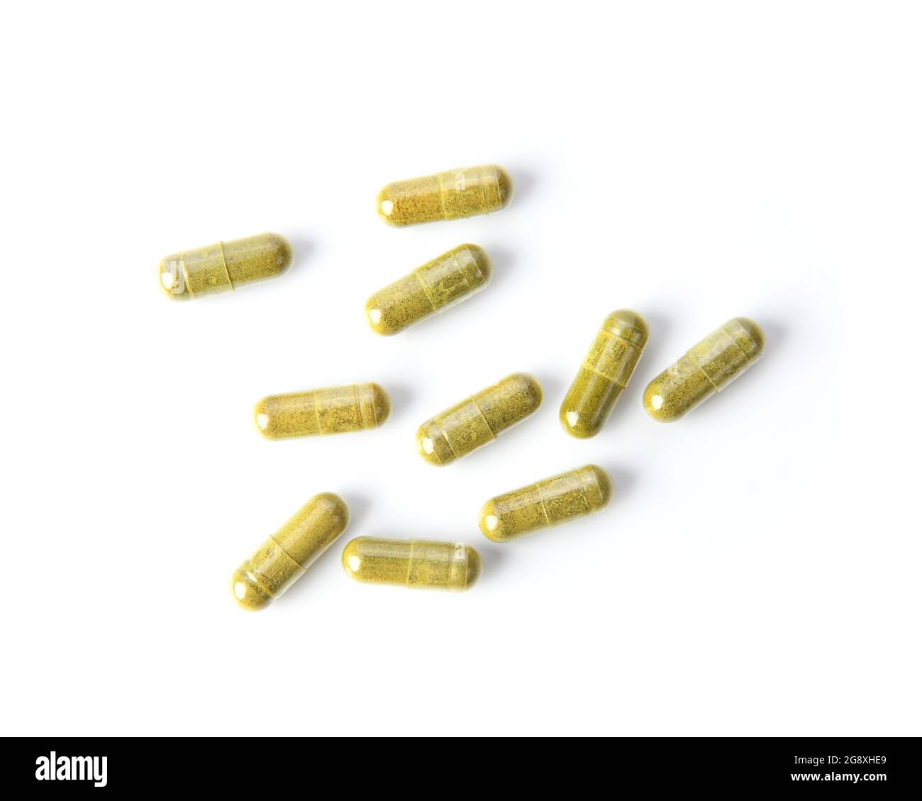 Herbal Capsules on white background Stock Photo - Alamy