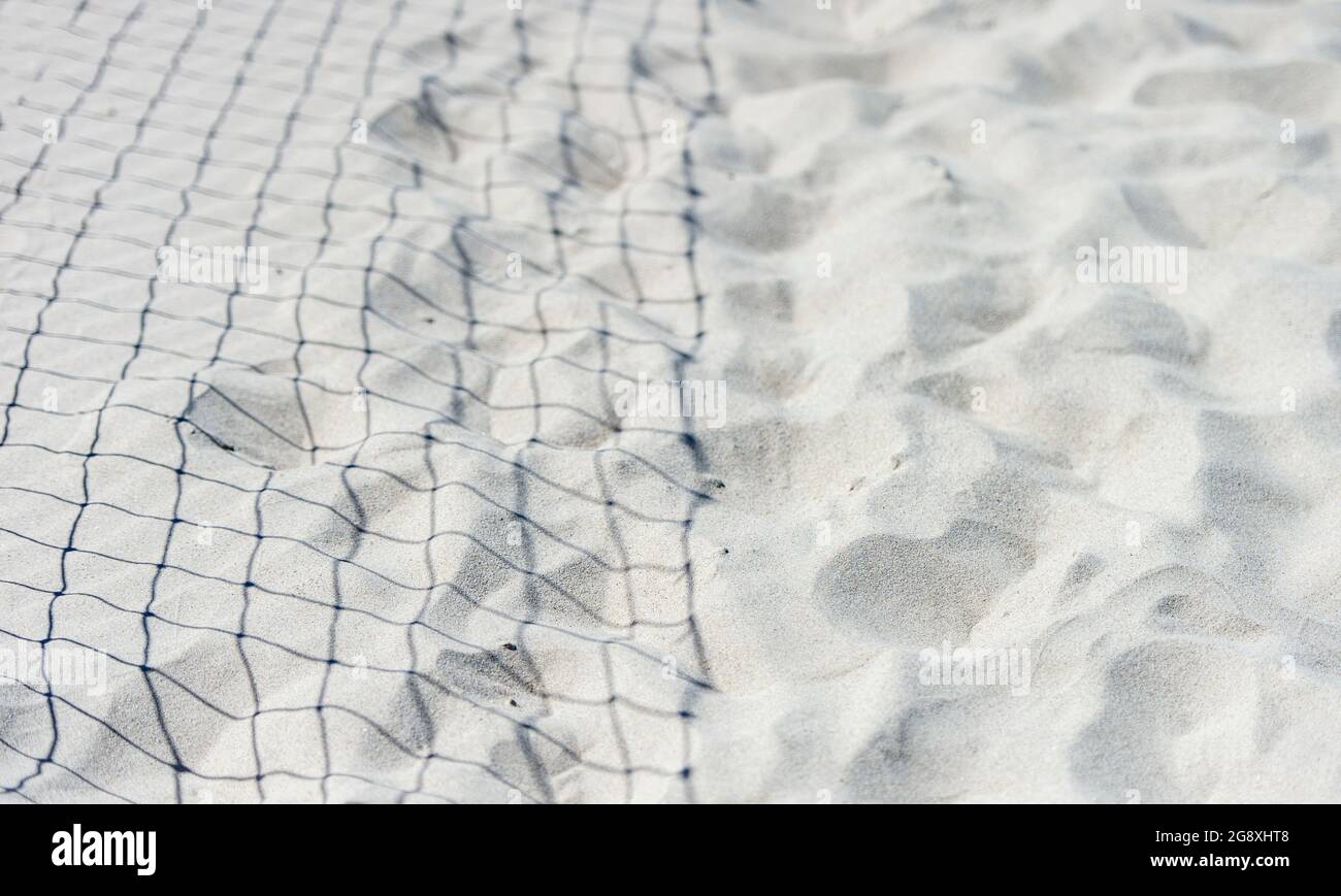 Net shadows on sand for background design. Sport team concept Stock ...