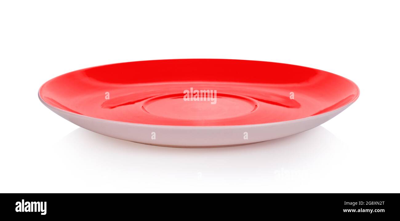 red ceramic plate on white background Stock Photo - Alamy