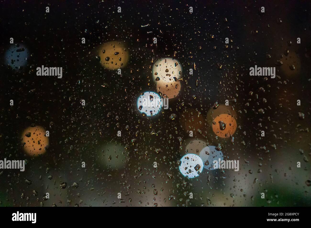 Close up water drops slide hi-res stock photography and images - Alamy