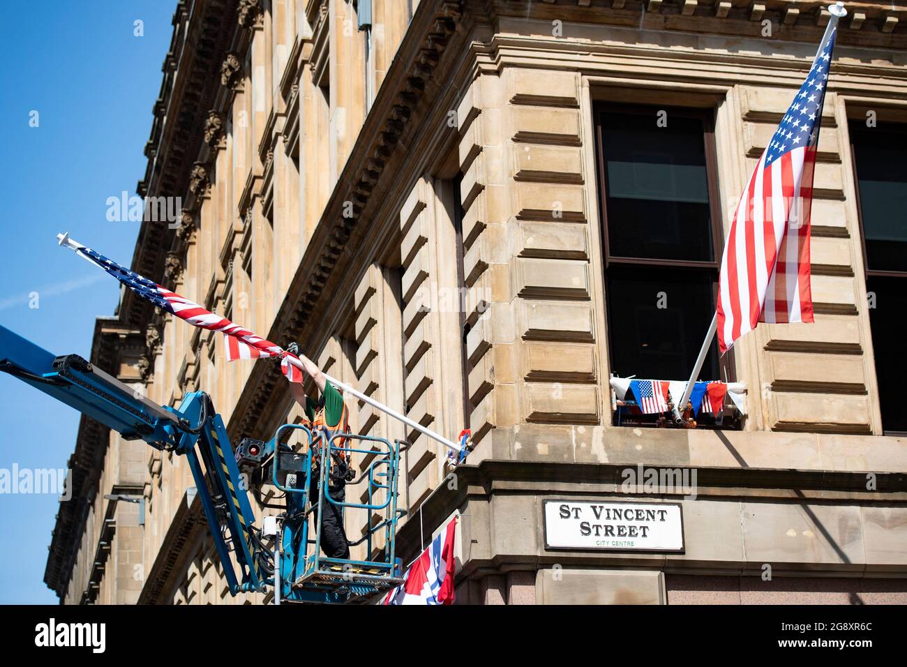 Glasgow, Scotland, UK. 22 July 2021. PICTURED: Cherry pickers move in ...