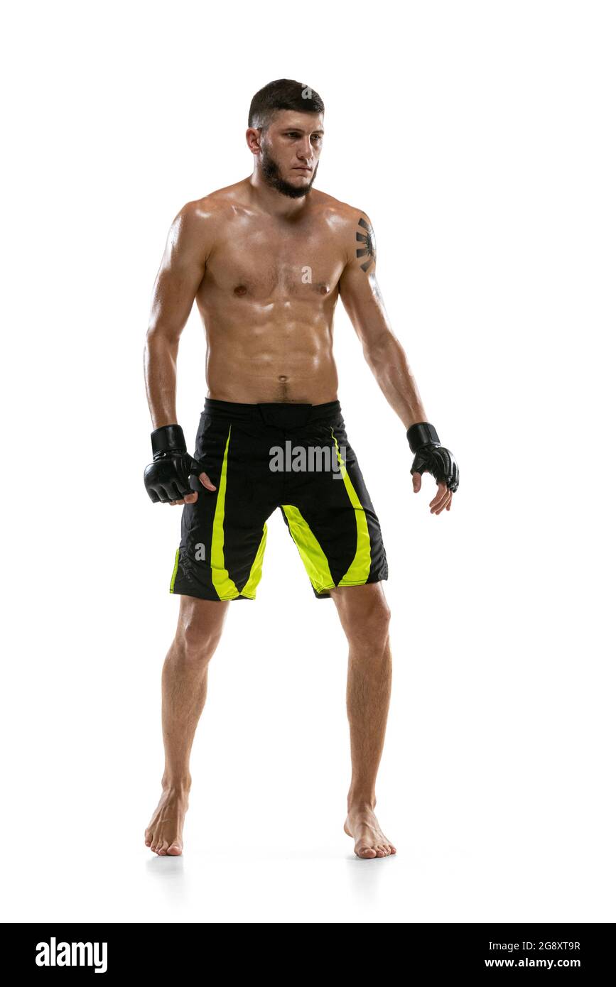 Full-length portrait of Caucasian athlete, professional male MMA boxer ...
